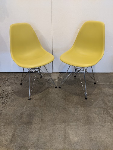 Pair Vitra Eames molded plastic dining chairs – Modele's Home Furnishings